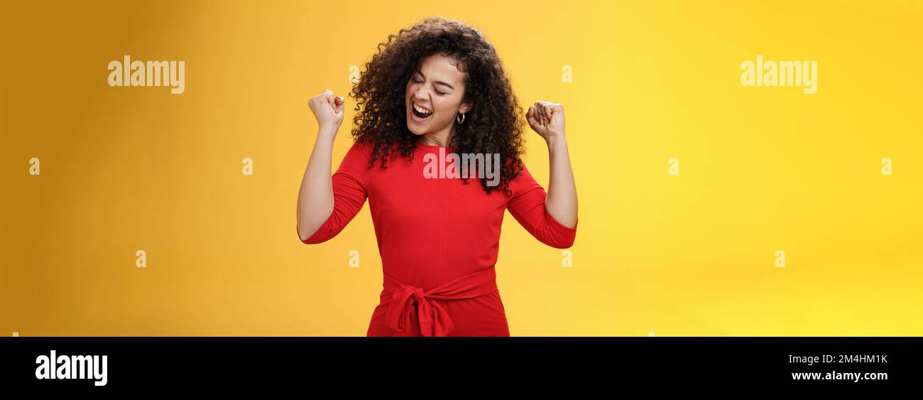 Girl enjoying cool music feeling awesome as relaxing at party dancing ...