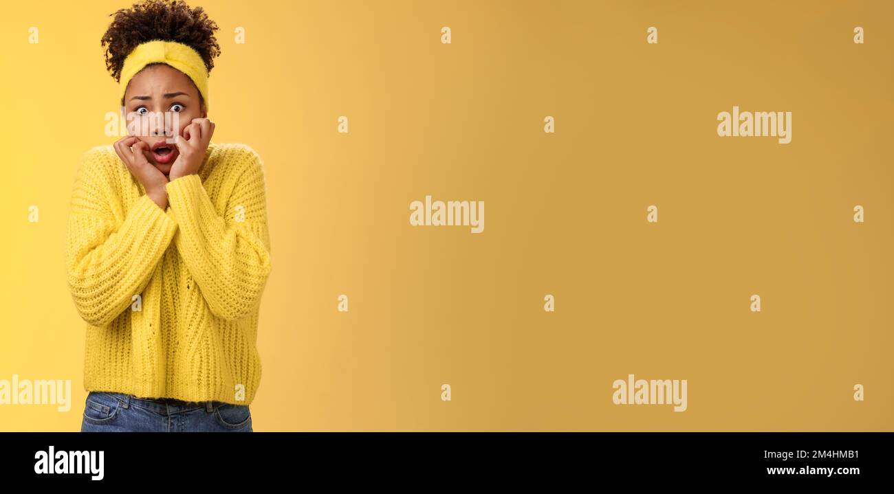 Scared stupefied trembling insecure timid african american woman afraid ...