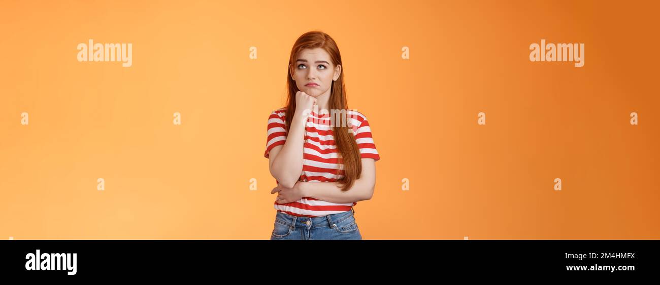 Upset redhead woman losing lottery feel uneasy distressed, look up ...