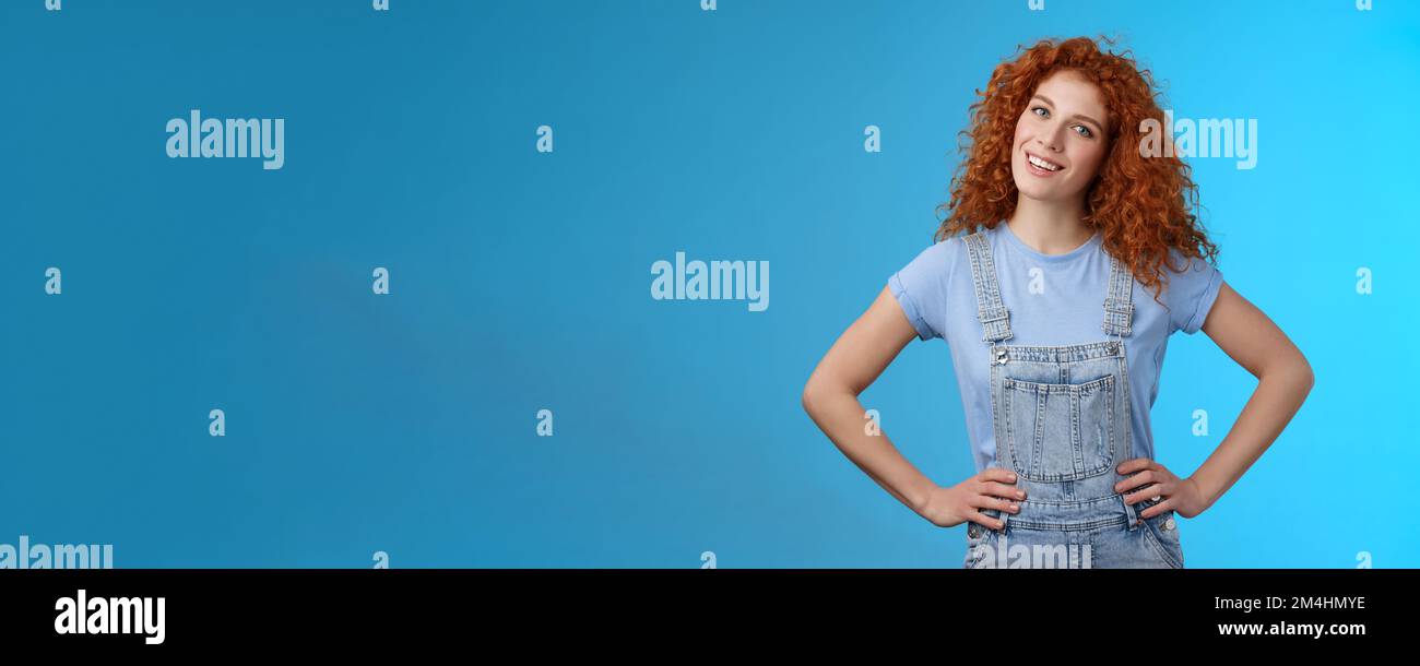 Cheerful motivated accomplished attractive redhead curly-haired ginger ...