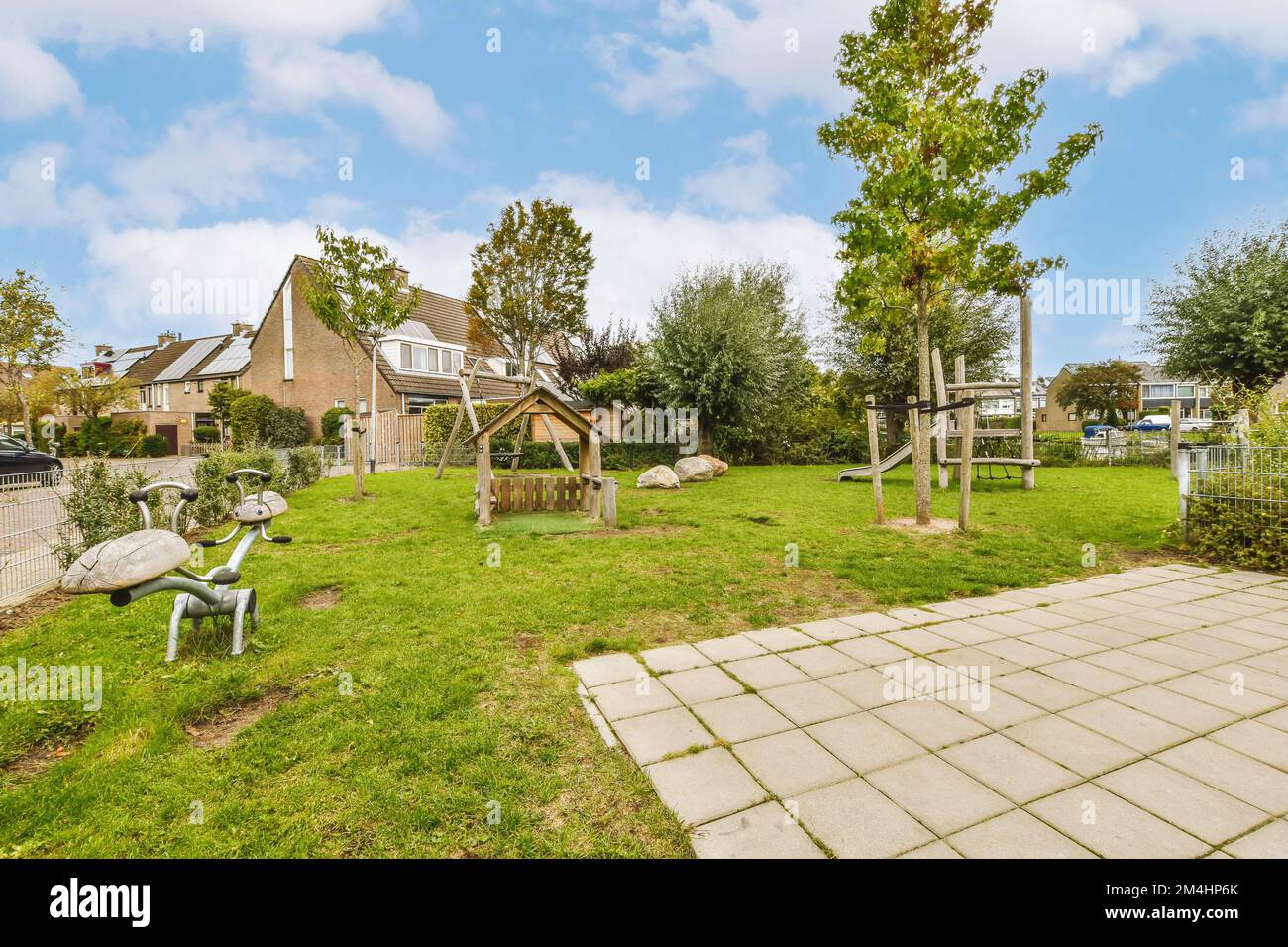 an empty backyard with some trees and lawns in the fore - image was ...