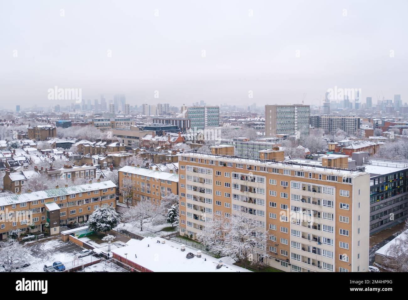 Aerial view of London rooftops covered in snow; Vauxhall and Elephant ...