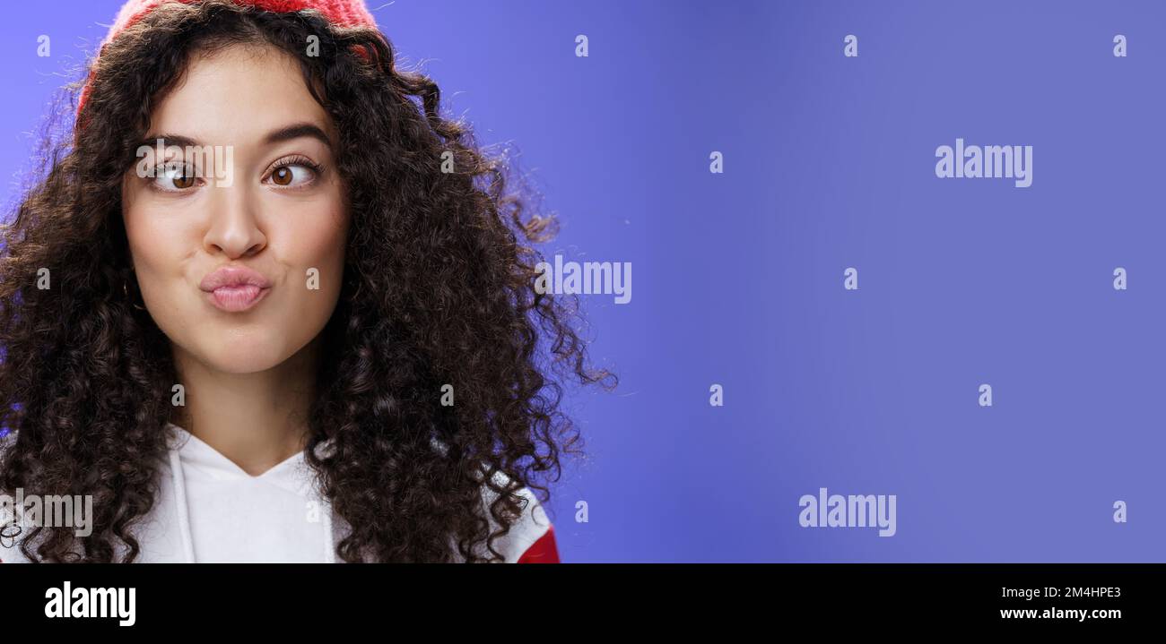 Headshot of funny and playful girl fooling around making faces not ...