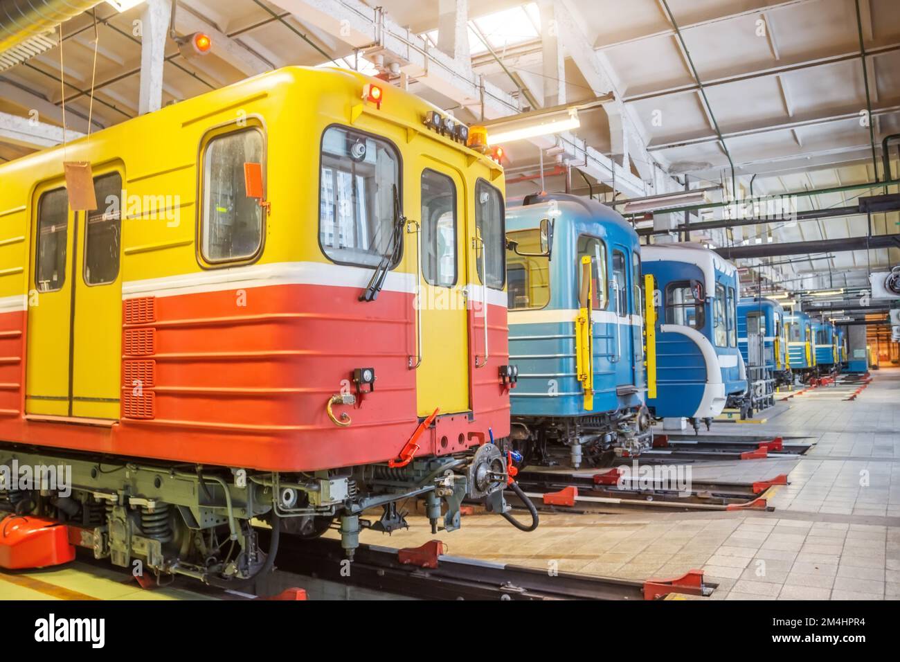 Passenger locomotives of the underground metro stand in a row in the ...