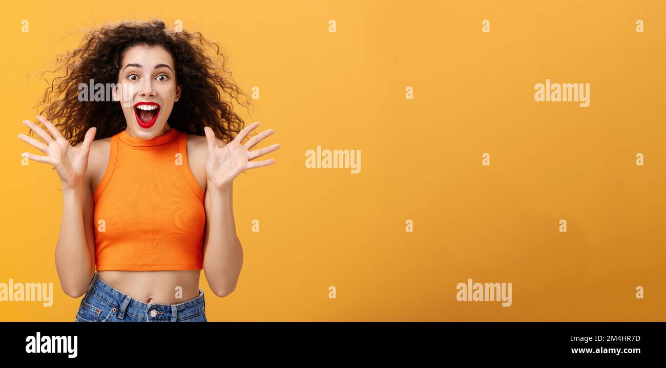 Excited impressed attractive stylish woman with nose ring, red lipstick ...