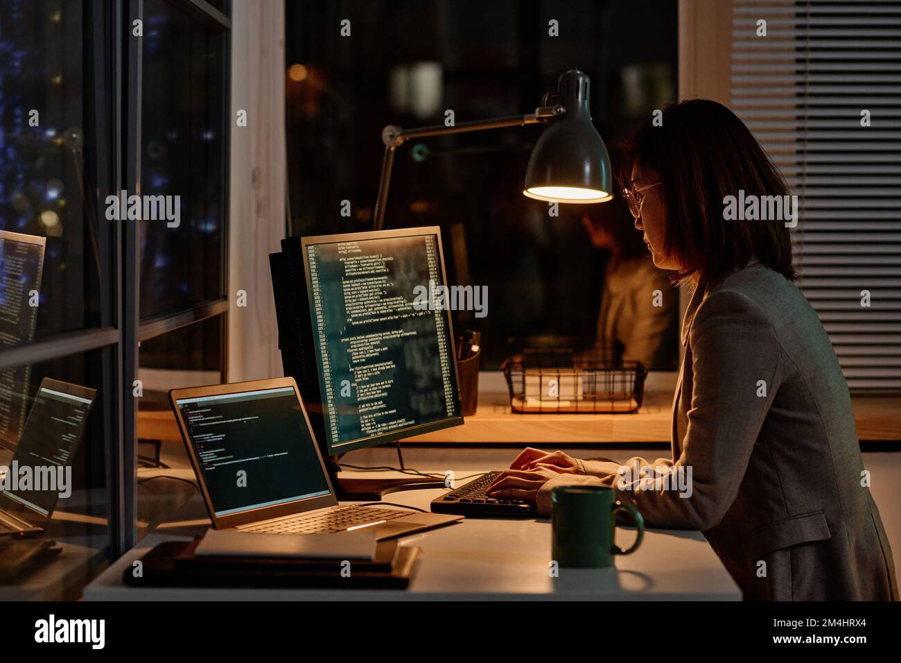 Serious asian female programmer hi-res stock photography and images - Alamy