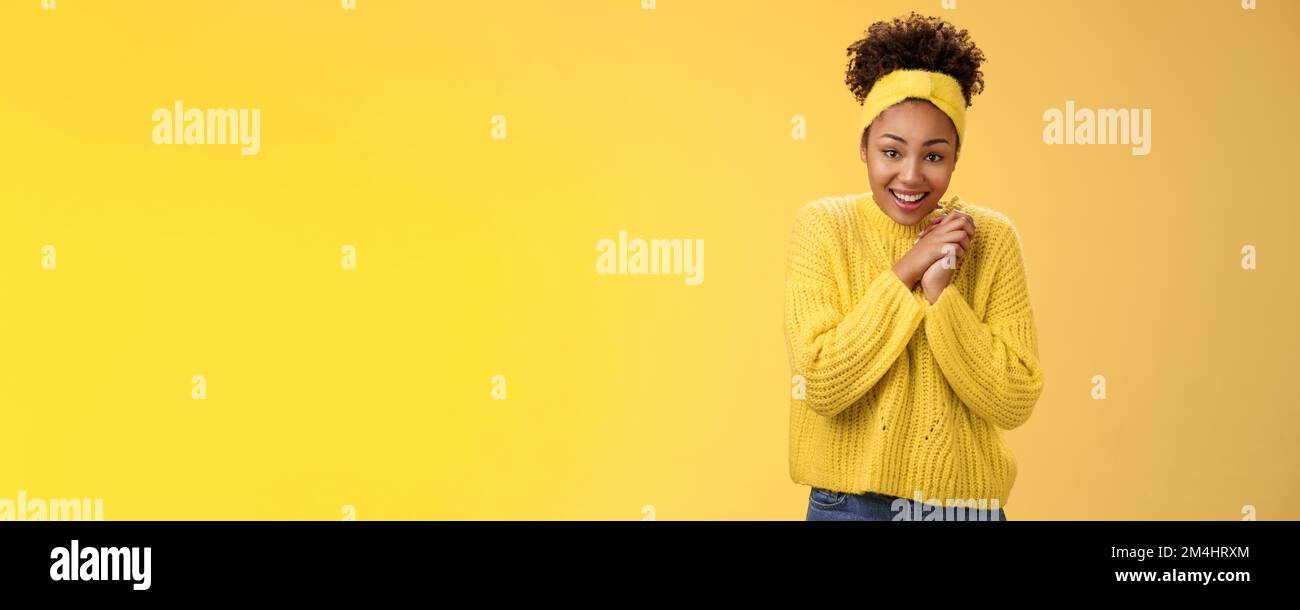 Touched tender african-american woman press palms together sighing ...