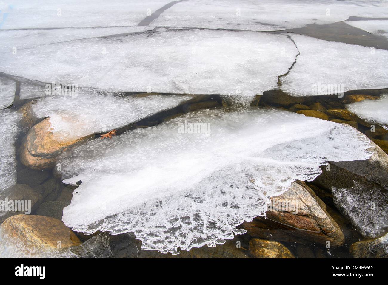 Melting ice, shoreline granite rock on Georgian Bay in early spring ...