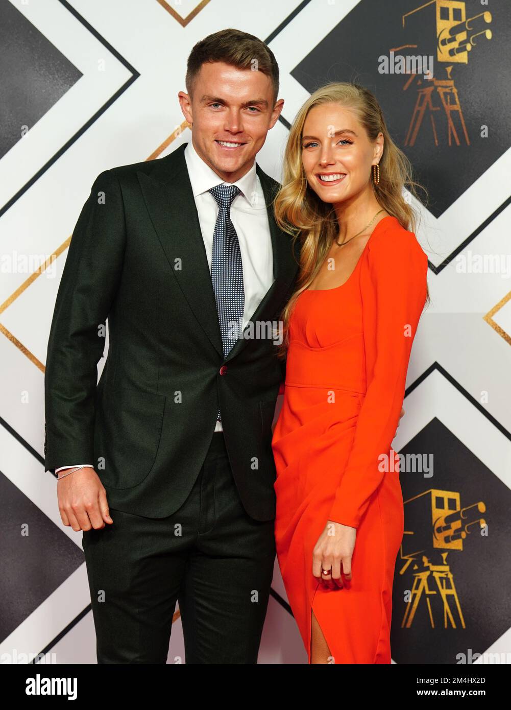 Sam Curran and partner Isabella Symonds Willmott pose on the red carpet ...