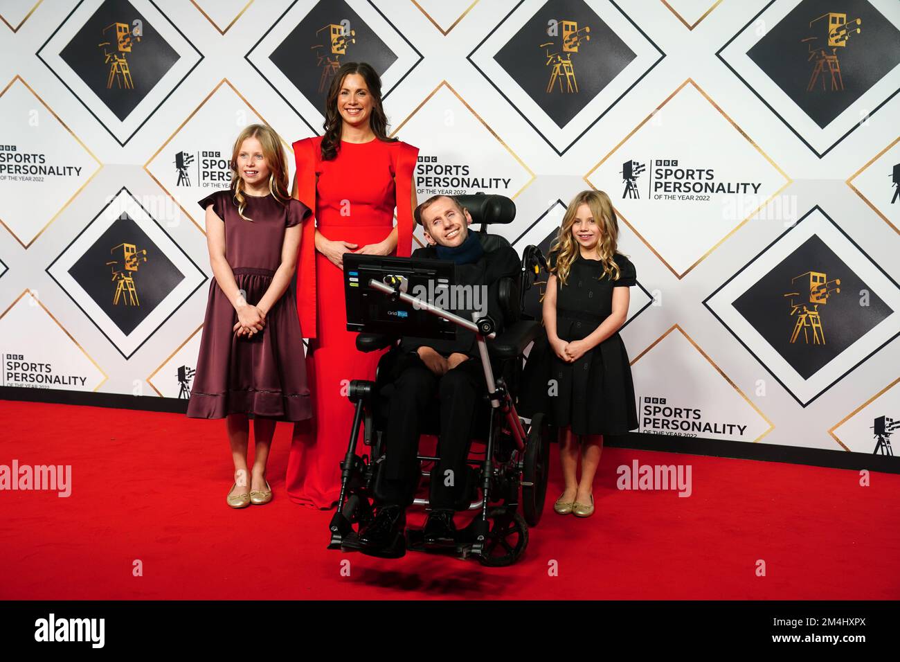 Rob Burrow poses on the red carpet with wife Lindsey and daughters ...