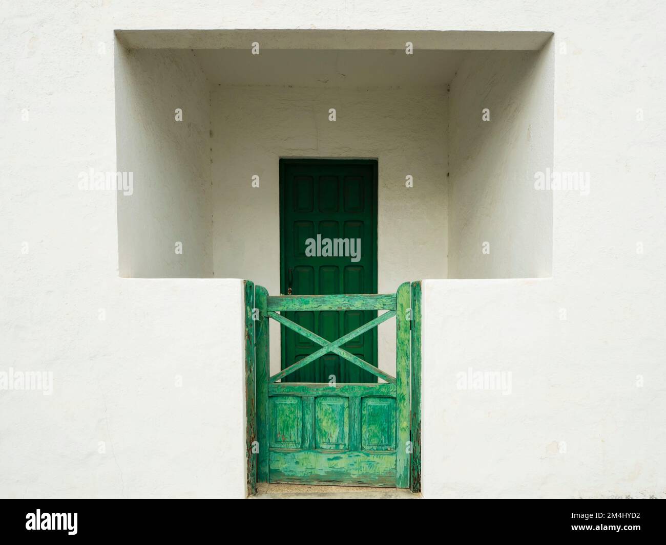 White house with old green gate and door, El Golfo, Lanzarote, Canary ...