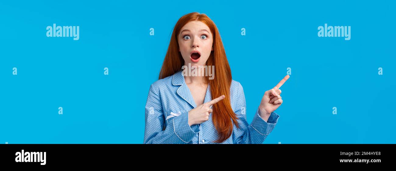 Surprised and shocked redhead female teenager living dormitory with ...