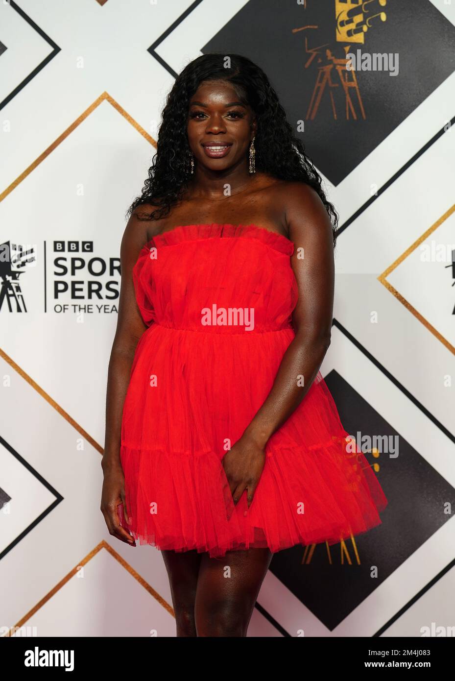 Asha Philip poses on the red carpet prior to the BBC Sports Personality ...
