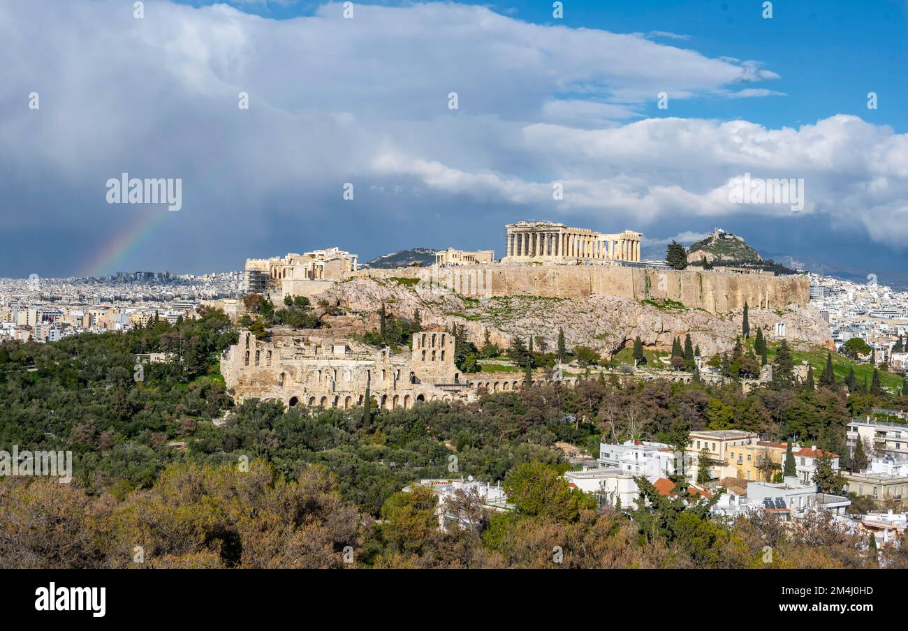 View from Philopappos Hill over the city with rainbow, panorama of the Parthenon Temple and ...