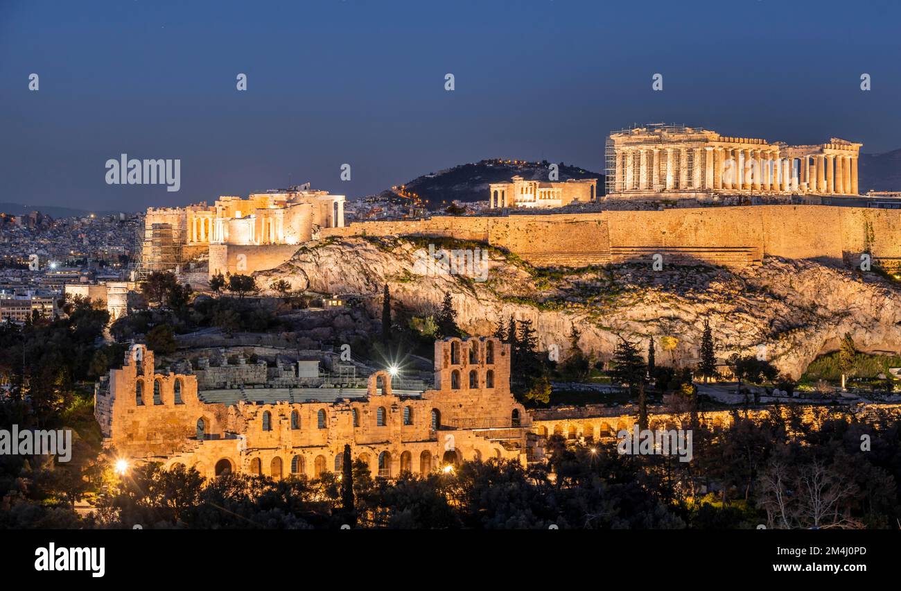 View of the Acropolis from Philopappos Hill, blue hour, illuminated Parthenon Temple and Herod's ...