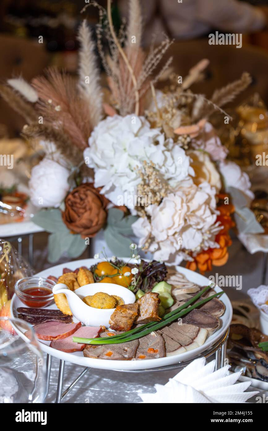 meat cuts of horse meat, beef and chicken on the table in the ...