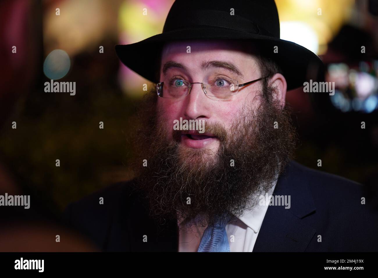 Rabbi Yisroel Lew, talks to the media on Oxford Street in London on the ...