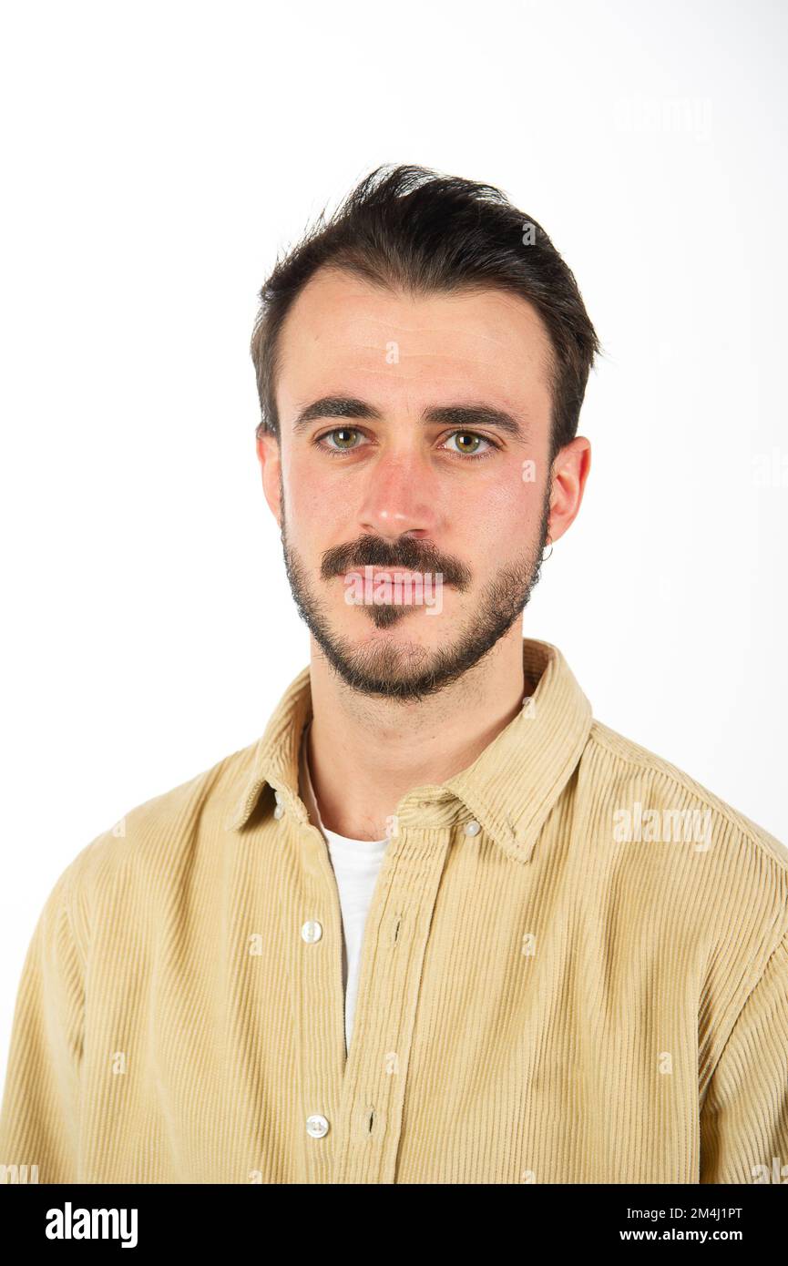 Close-up portrait of a dark boy with beard and hair isolated on white ...