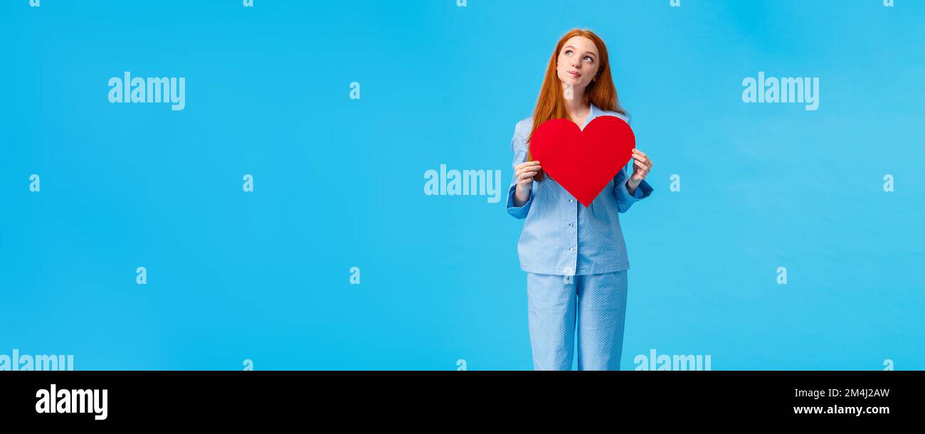 Dreamy and creative, redhead caucasian girl thinking what her future ...