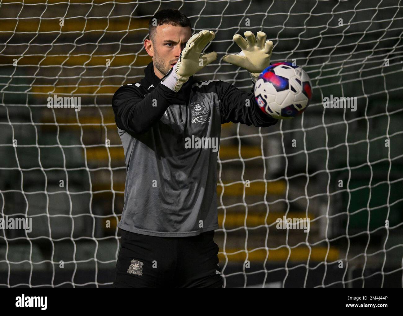 Plymouth Argyle goalkeeper Callum Burton (25) warming up during the ...