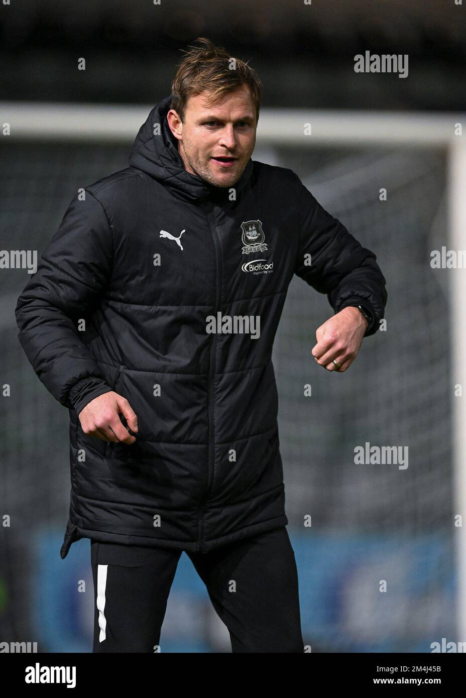 Plymouth Argyle Assistant Manager Mark Hughes warming up during the ... Plymouth Argyle Assistant Manager Mark Hughes warming up during the ...