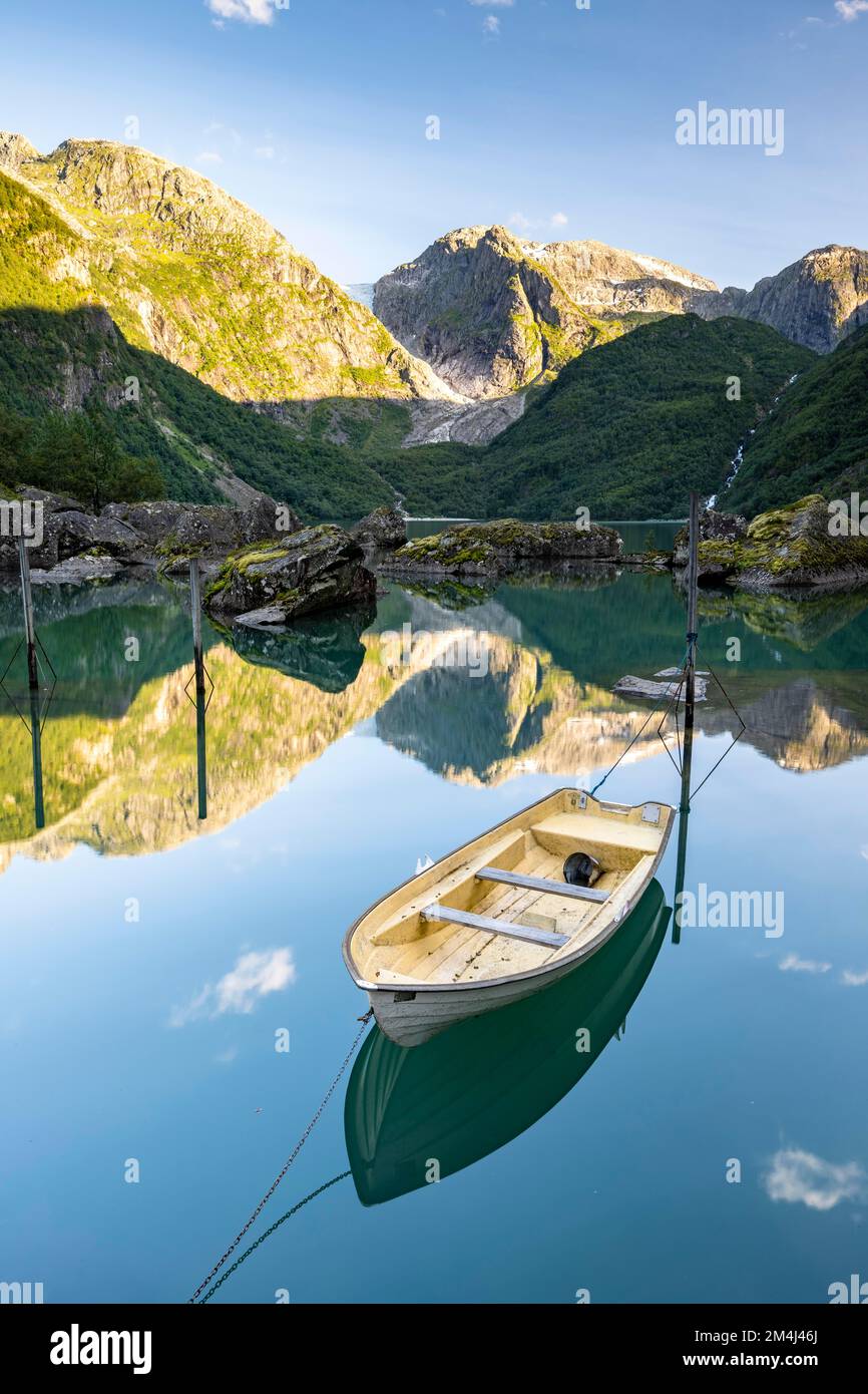 Glacial lake Bondhusvatnet with rowing boat, Bondhusdalen, Bondhusbreen ...