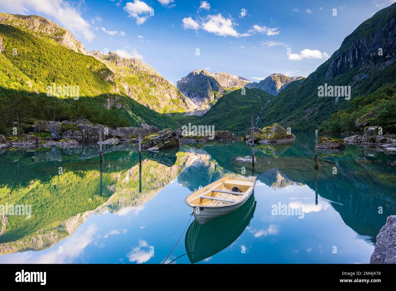 Glacial lake Bondhusvatnet with rowing boat, Bondhusdalen, Bondhusbreen ...