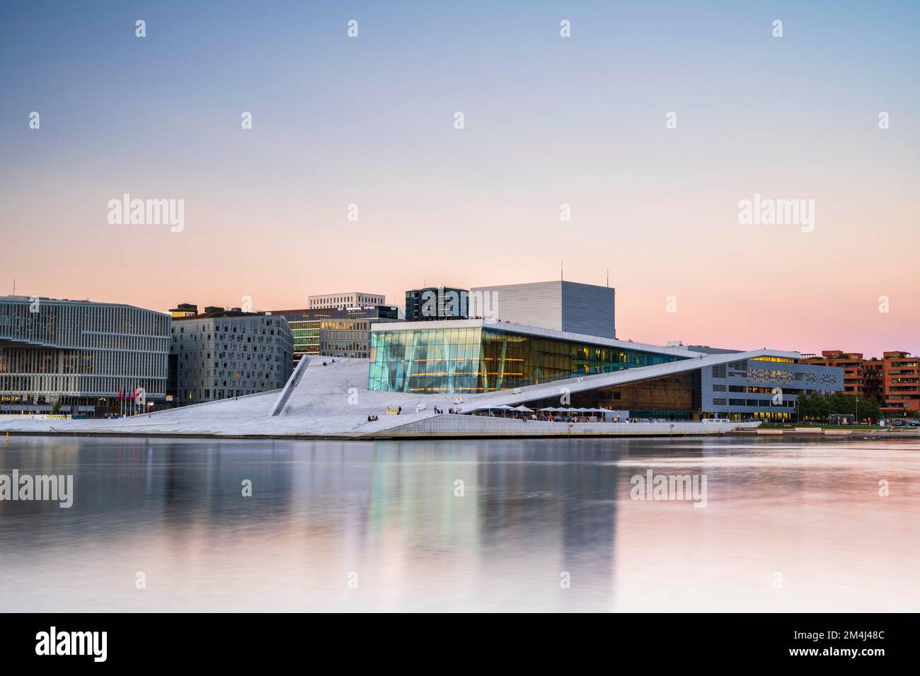 Oslo Opera House in the evening mood, Bjorvika district, Oslofjord ...