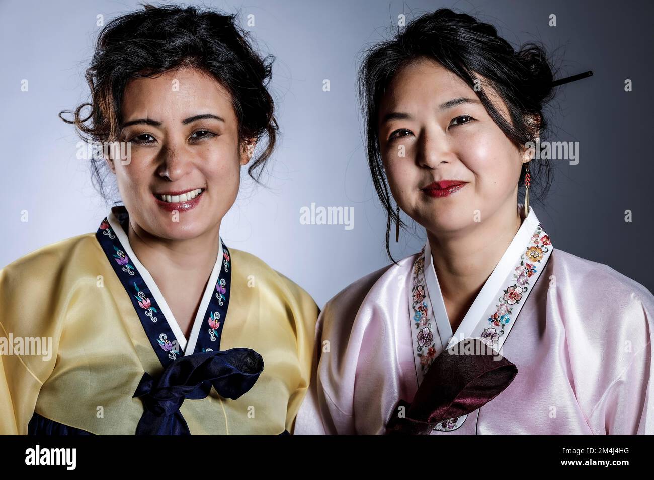Portrait of two woman in Korean traditional costume, Korean siblings in ...
