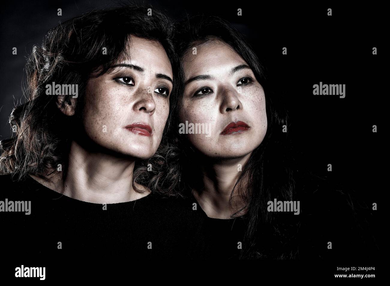 Two Asian woman, sisters, Korean siblings Stock Photo - Alamy