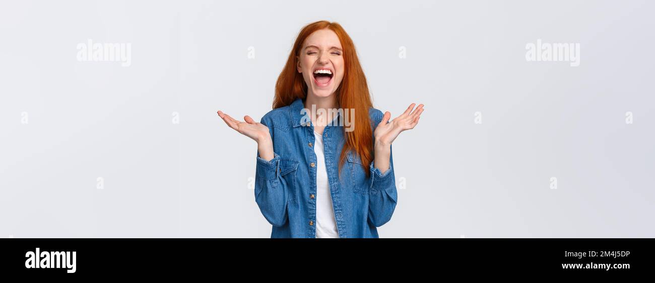 Lol so funny. Amused and carefree pretty redhead female student clap ...