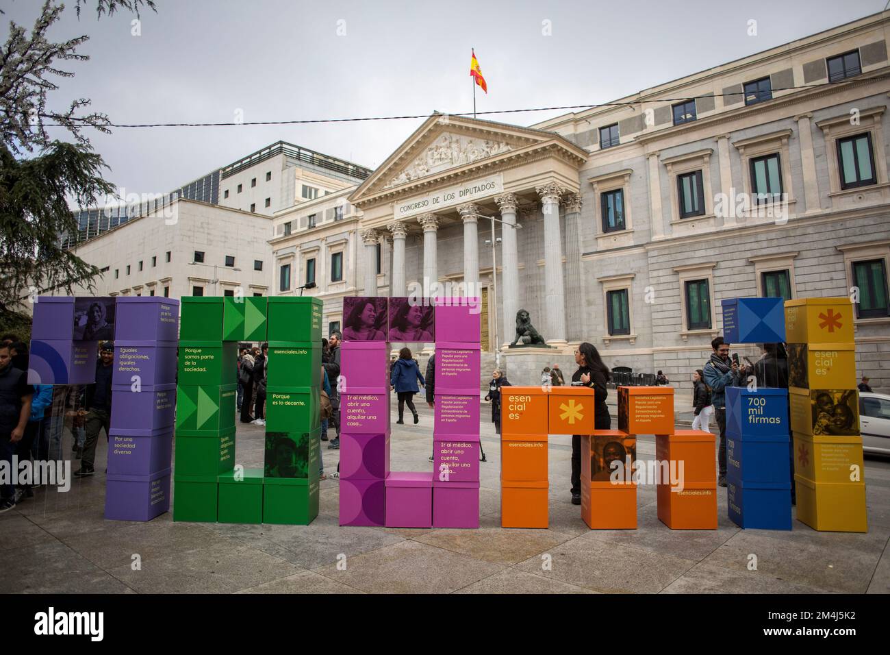 Madrid, Spain. 21st Dec, 2022. Colored boxes with slogans form the ...