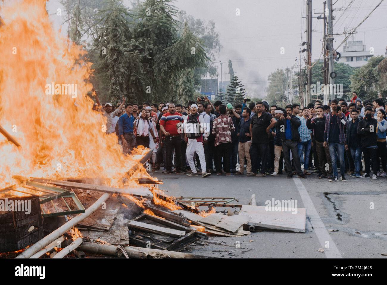 The crowd making fire on the street at CAB Protest in Guwahati, Assam ...