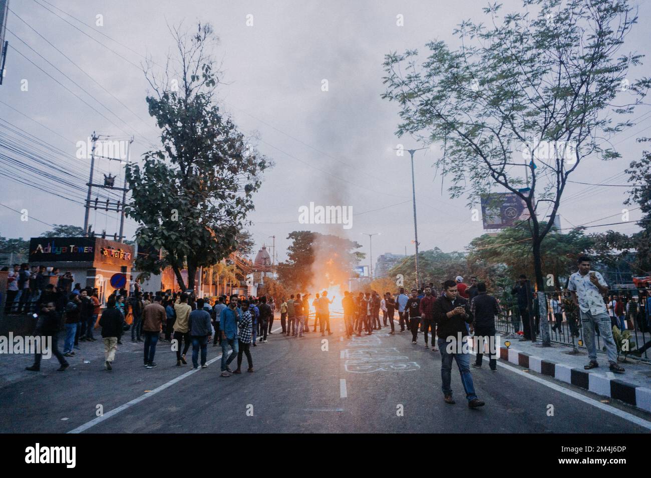 The crowd making fire on the street at CAB Protest in Guwahati, Assam ...