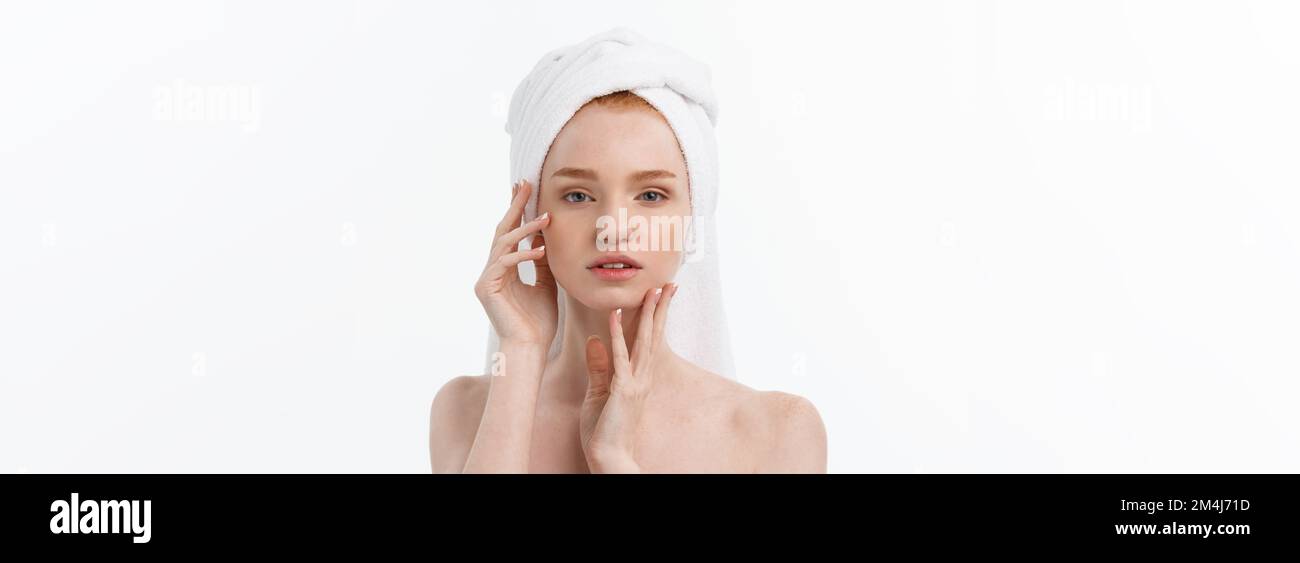 beautiful model applying cosmetic cream treatment on her face on white Stock Photo - Alamy