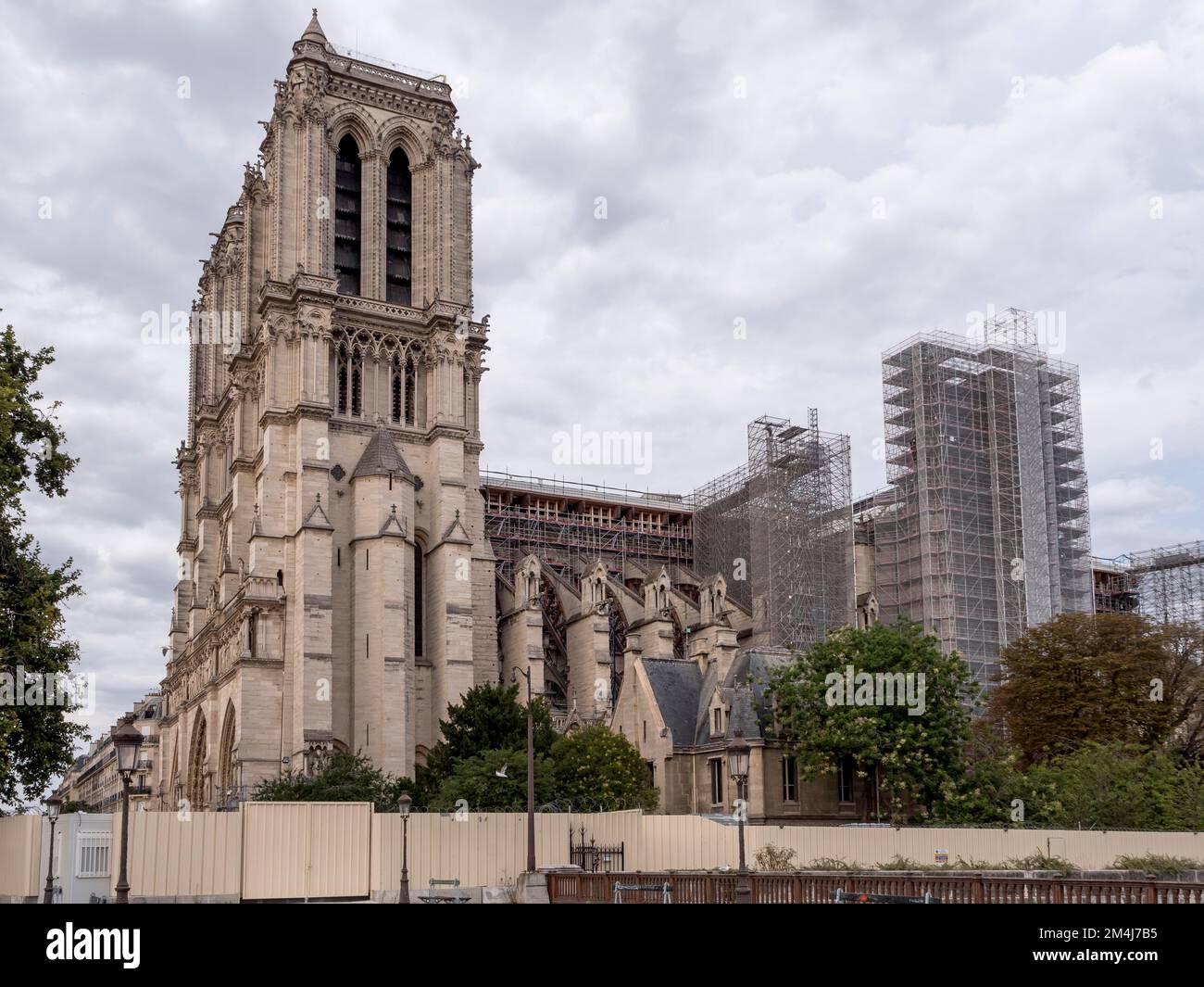 Side view of Notre-Dame de Paris Cathedral with large scaffolding for ...