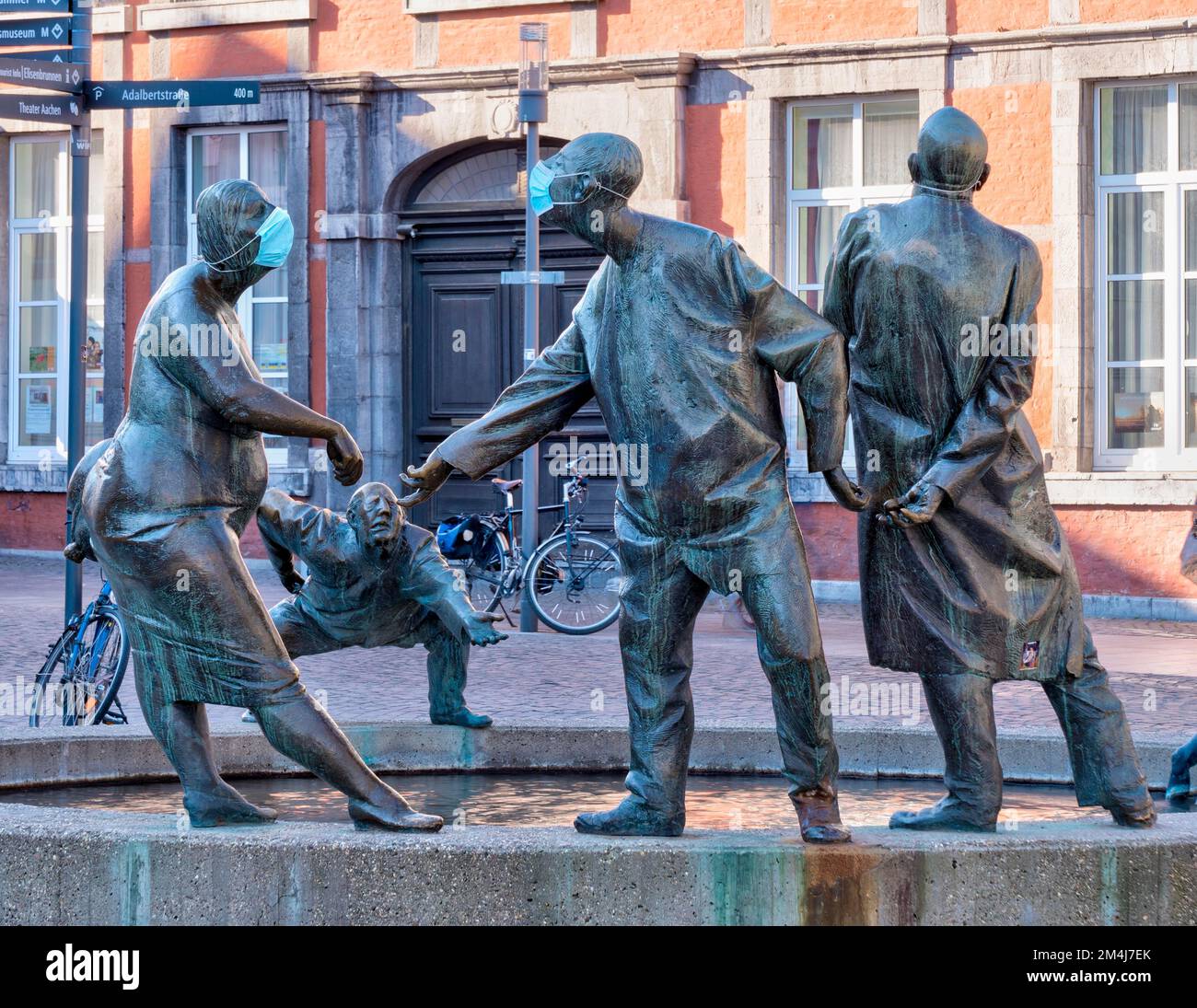 Four human figure in the fountain of the cycle of money - Geldbrunnen ...