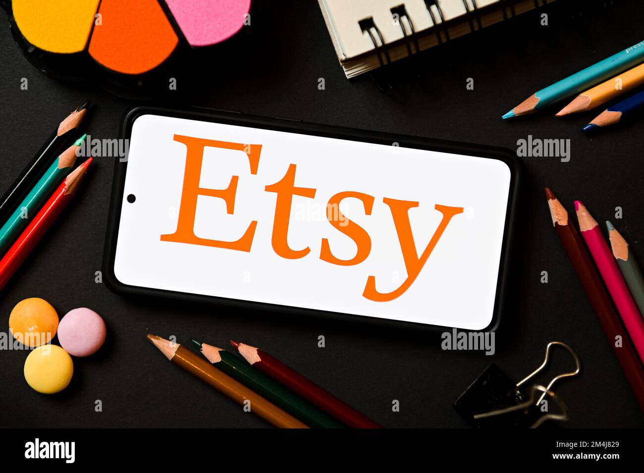 In this photo illustration an Etsy logo seen displayed on a smartphone ...