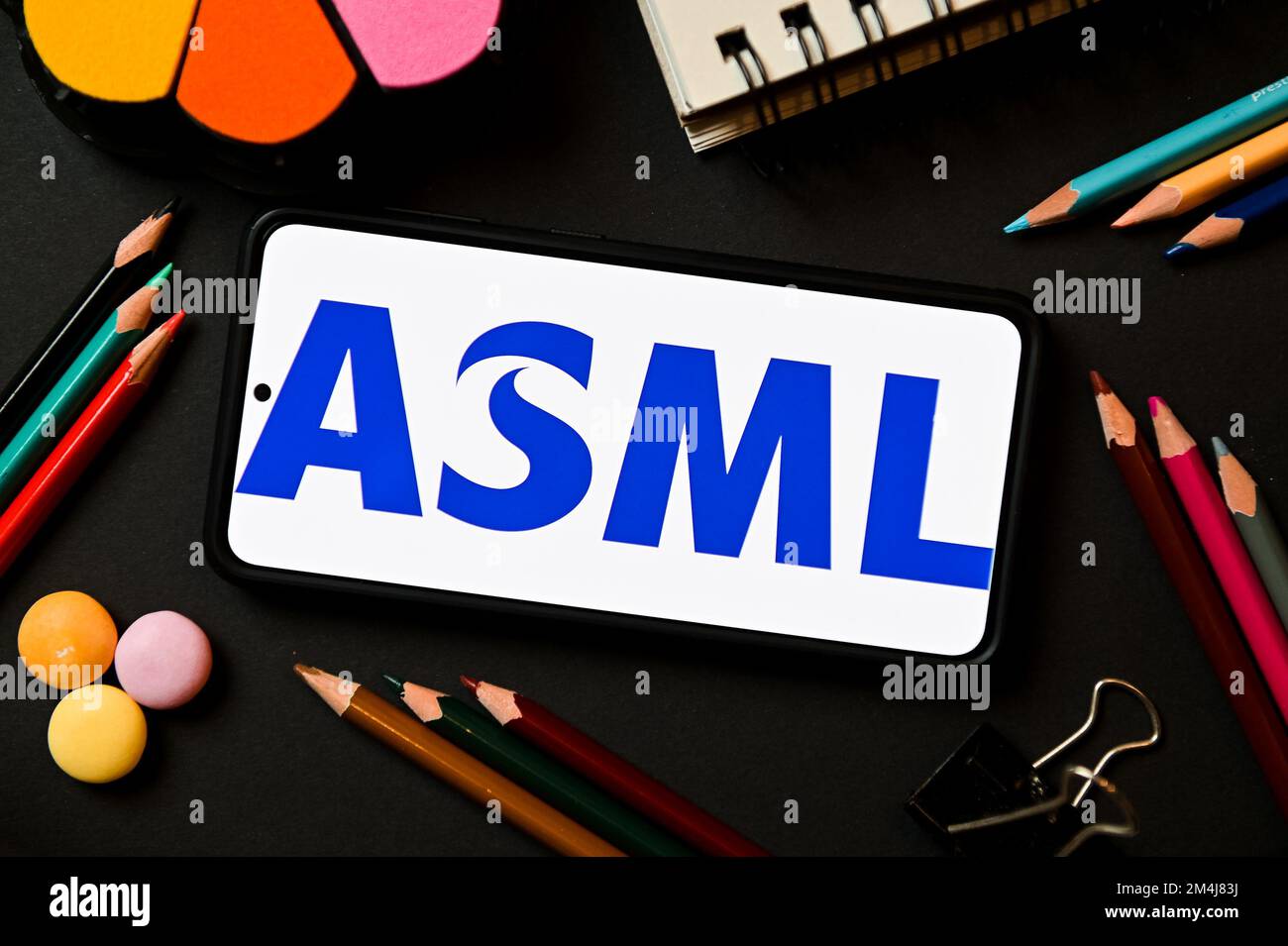 In this photo illustration an ASML logo seen displayed on a smartphone ...