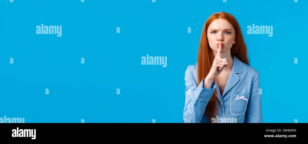 Quiet please Im trying sleep. Displeased and disturbed young redhead ...