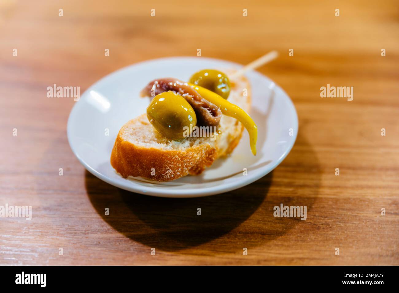 Traditional basque tapas: The gilda is a type of tapa, banderilla or ...
