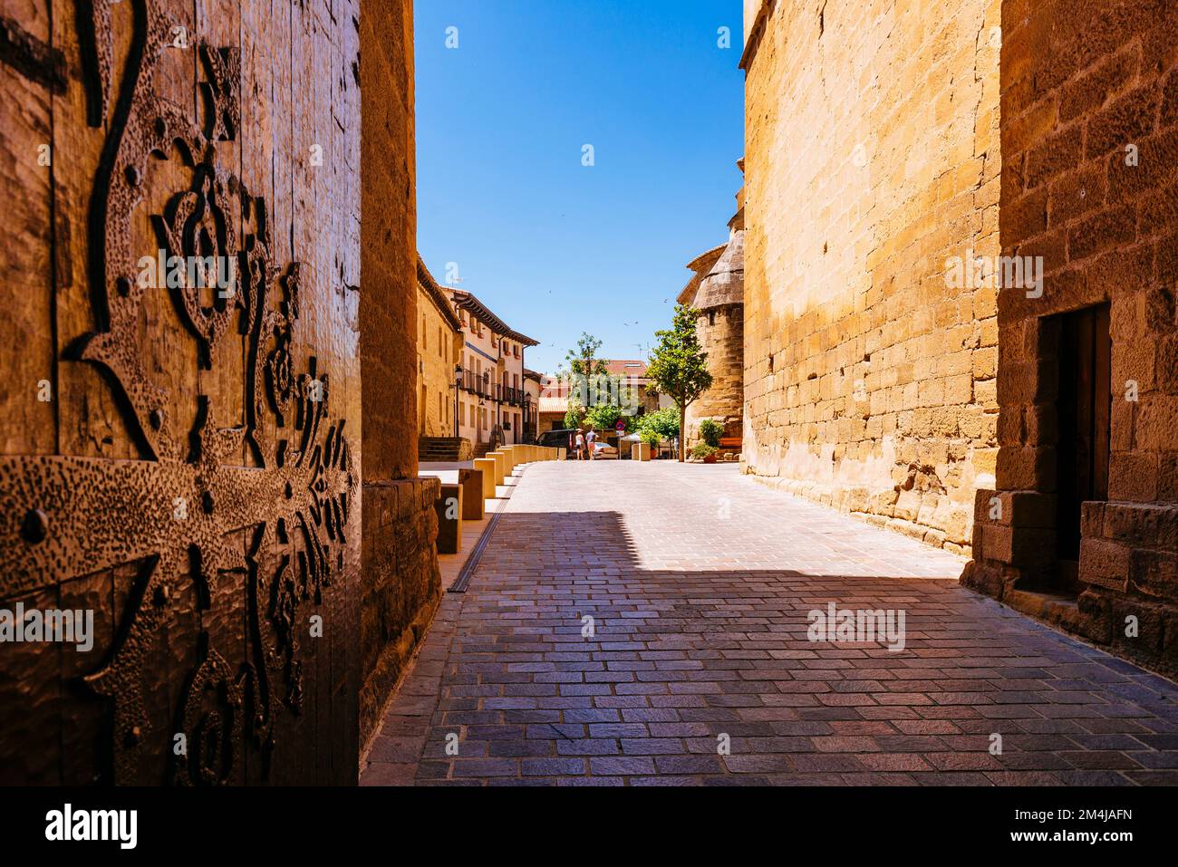 Village street. San Juan Gate, one of the entrances to the walled town ...
