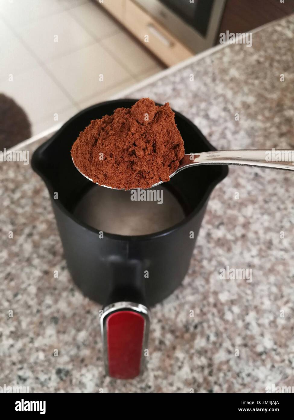 Making ground turkish coffee in hi-res stock photography and images - Alamy