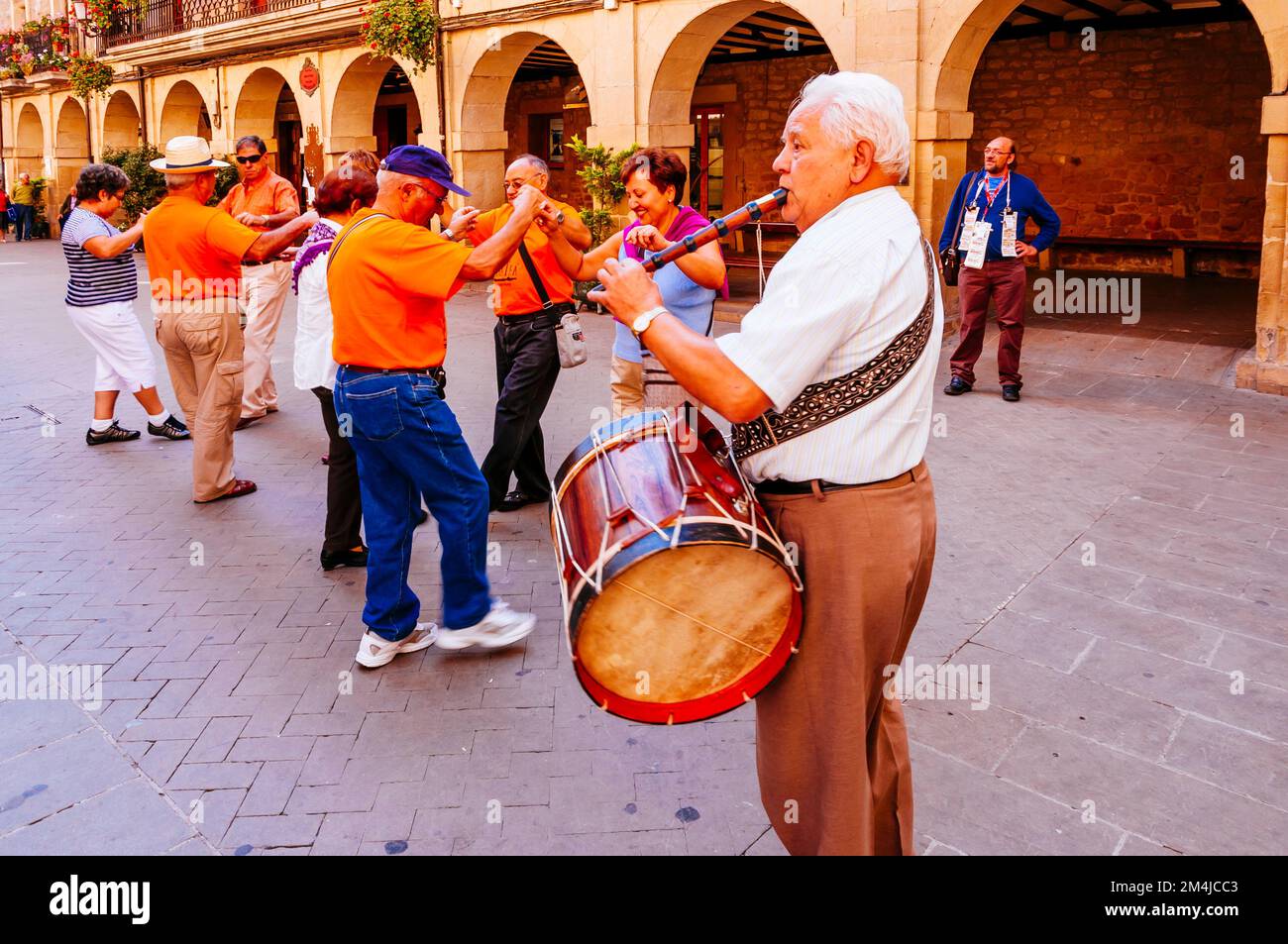 Group of people dancing to the sound of drum and flute. Plaza Mayor ...