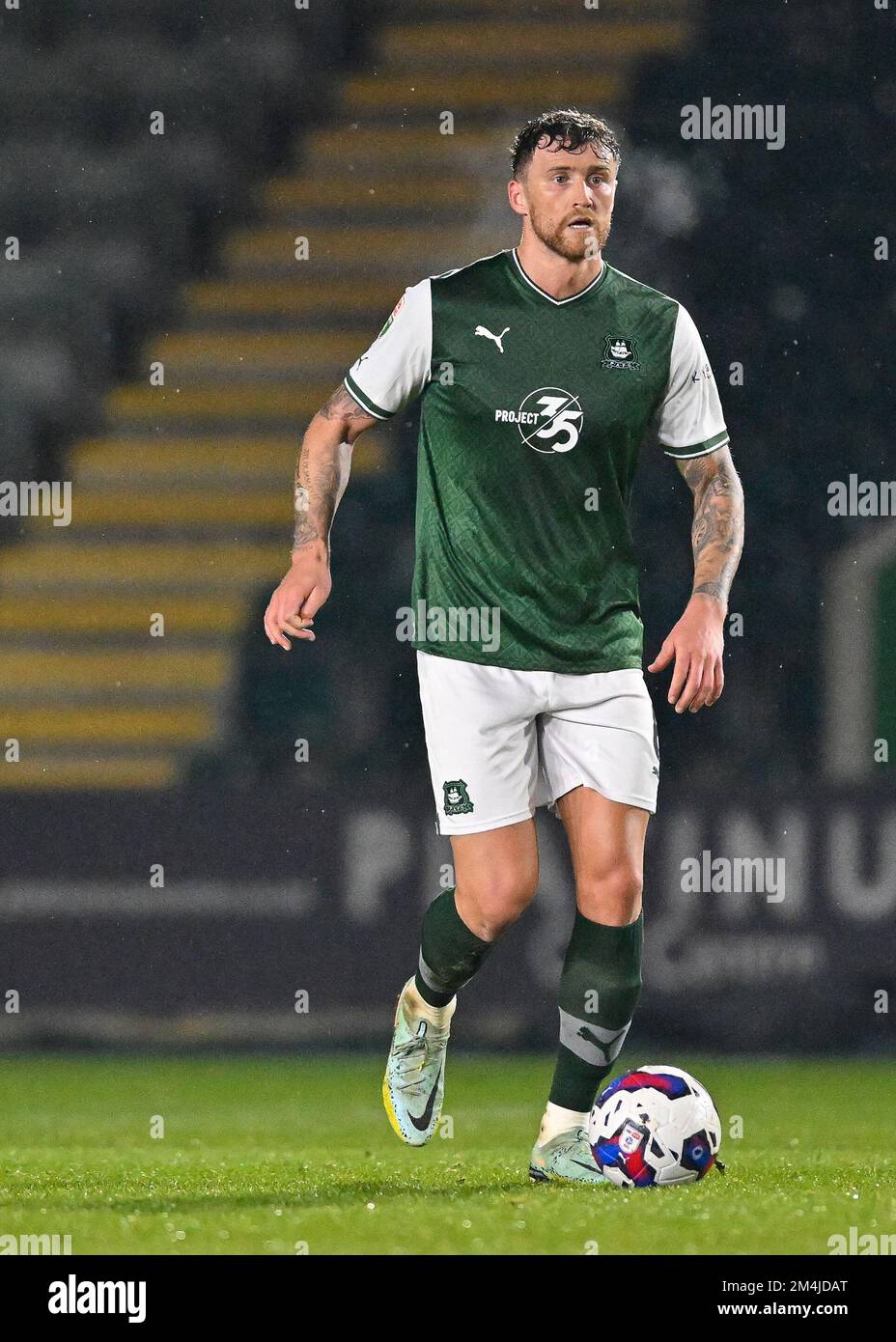 Plymouth Argyle defender Dan Scarr (6) on the ball during the Papa John ...