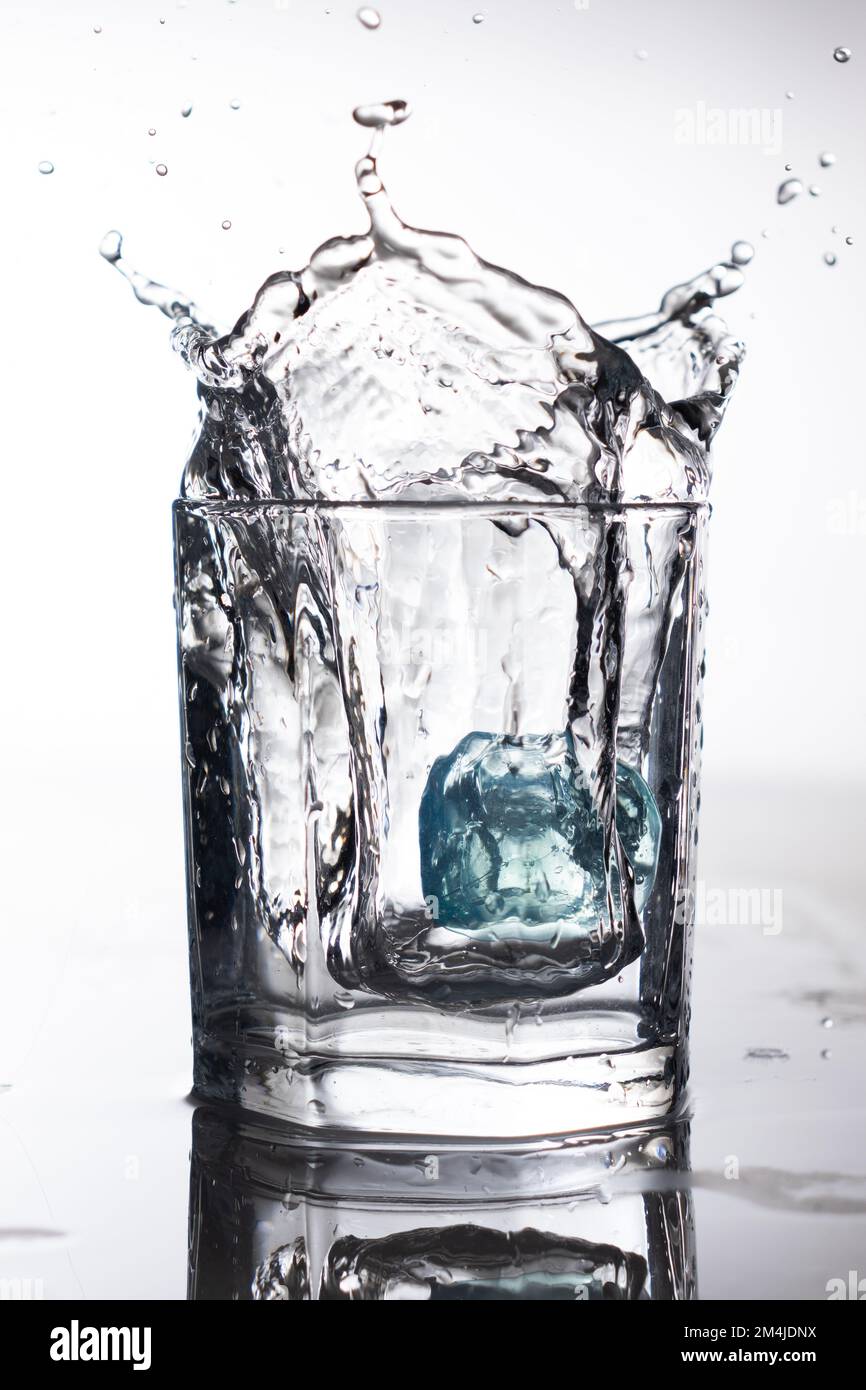 Splash of ice in wine glass hi-res stock photography and images - Alamy