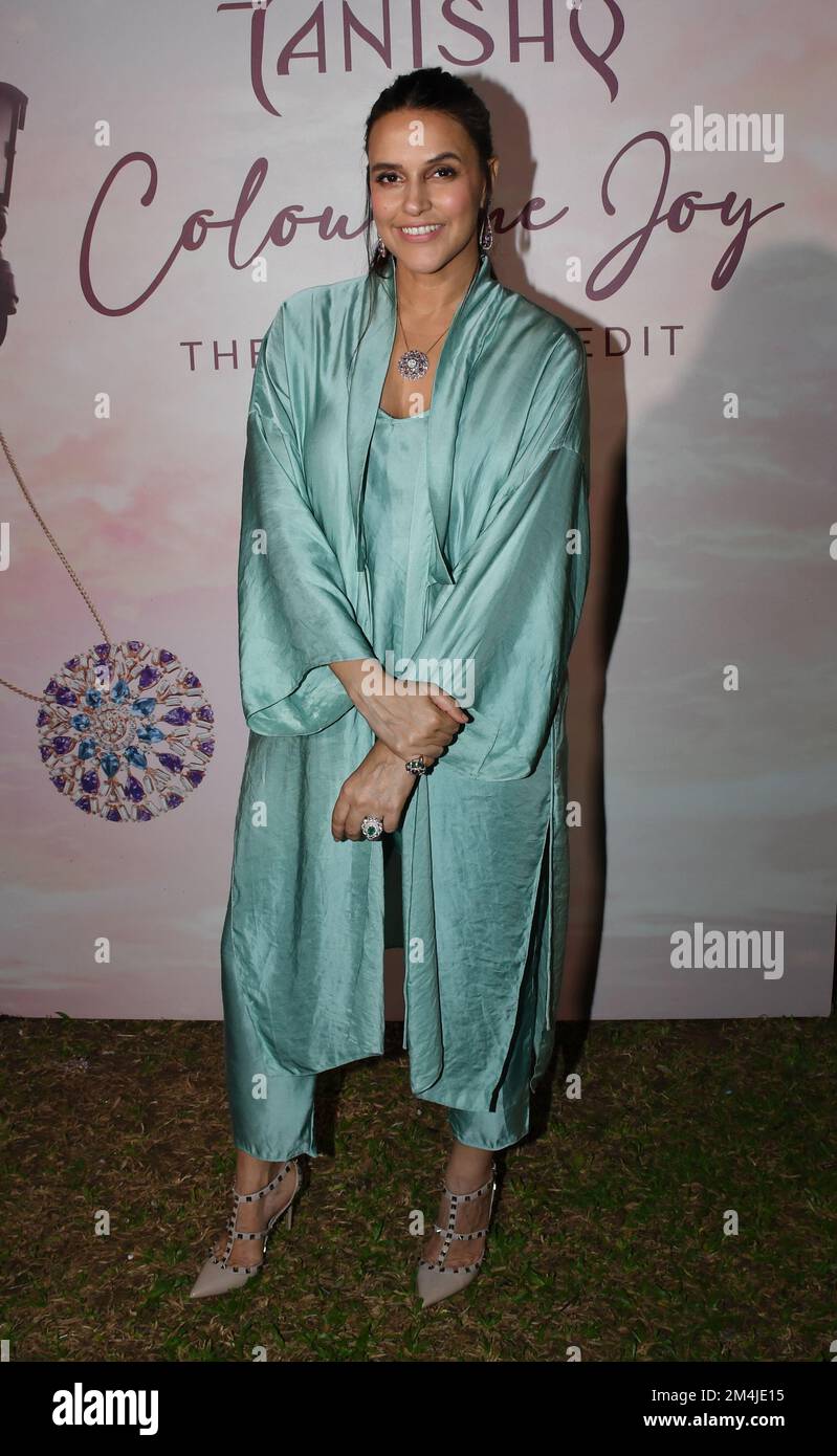 Bollywood actress Neha Dhupia poses for a photo during the unveiling of ...