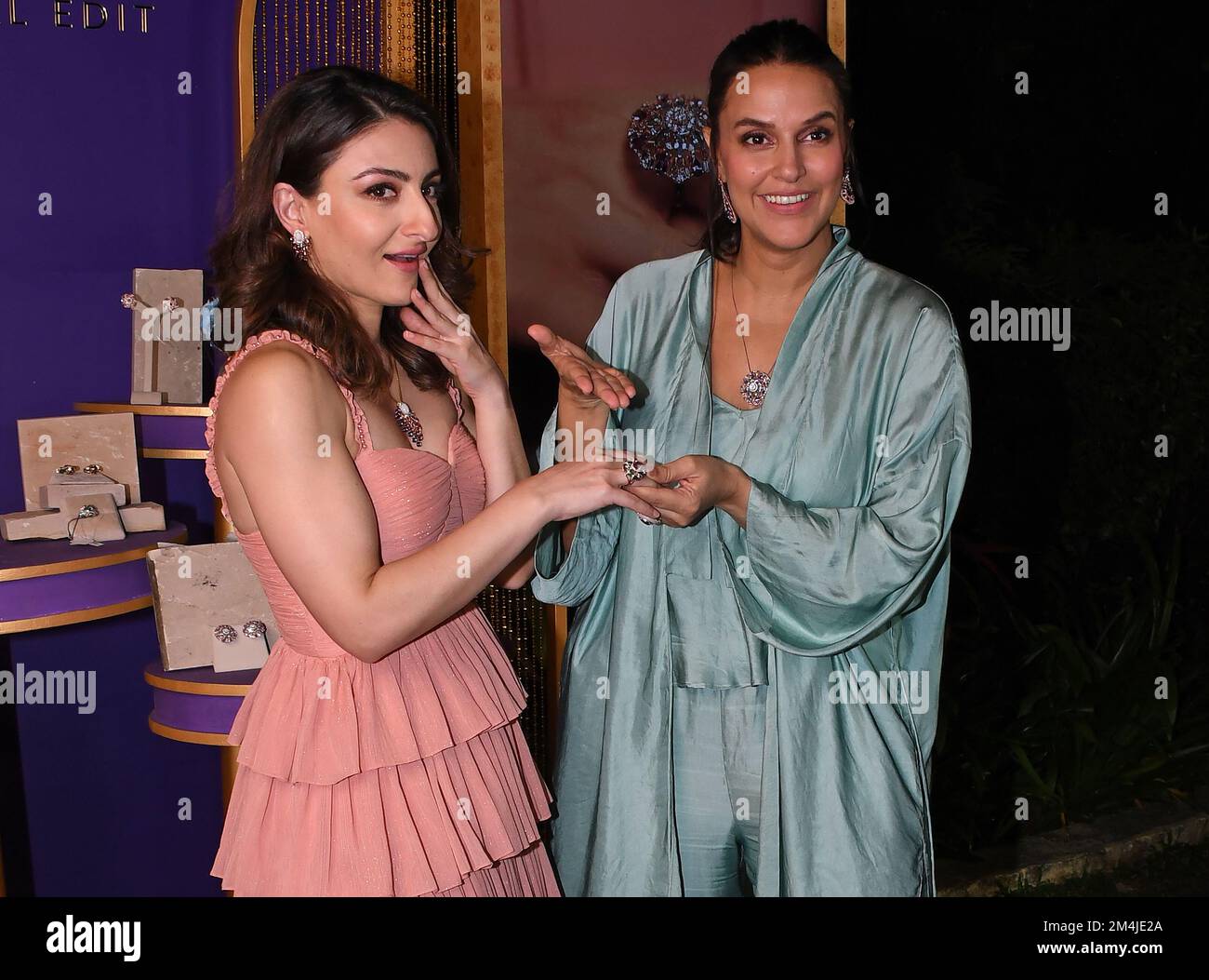 L-R Bollywood actress Soha Ali Khan and Neha Dhupia react to the camera ...
