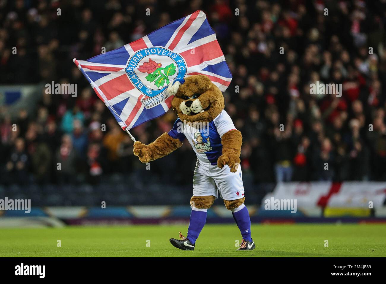 Blackburn, UK. 21st Dec, 2022. Rover The Dog waves a during the Carabao ...