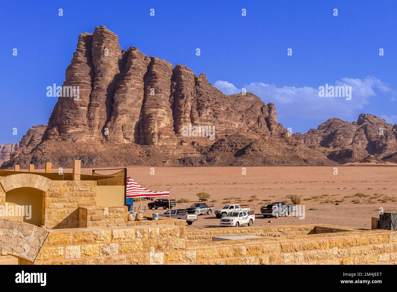 Jordan, Wadi Rum - November 2, 2022: Cars near the entrance to Wadi Rum ...